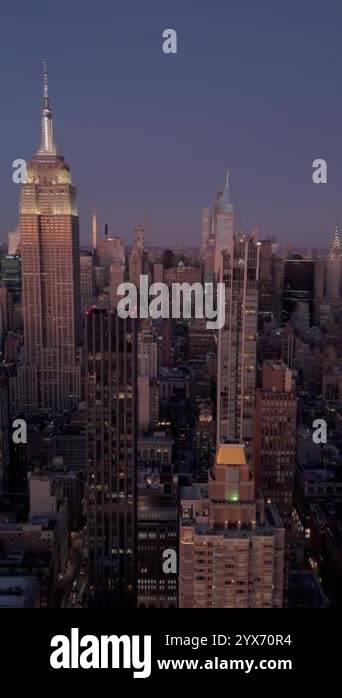 Vertical aerial views capture the Empire State Building in Midtown ...