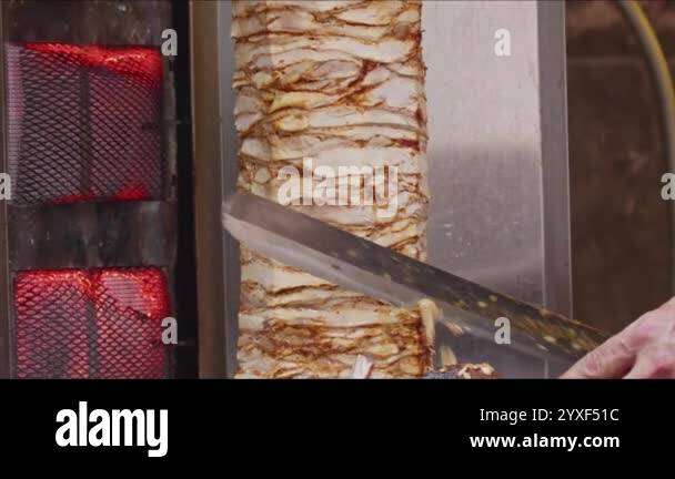 Doner Kebab Master Cuts Cooked Chicken Meat with Knife Footage Stock ...