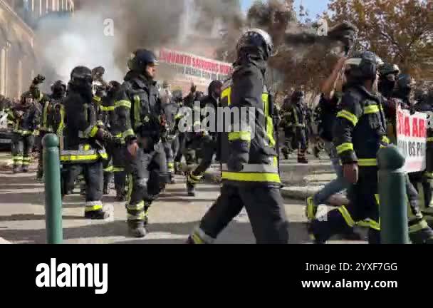 Angry crowd of firefighters are rallying in front of the city ...