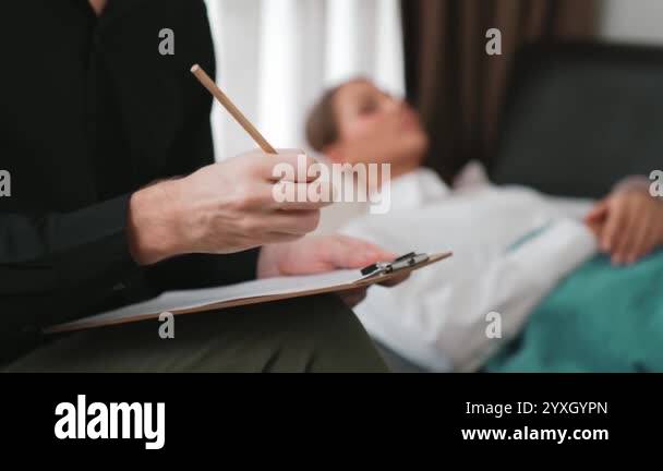 Young female patient lying on crouch release emotion from traumatic ...