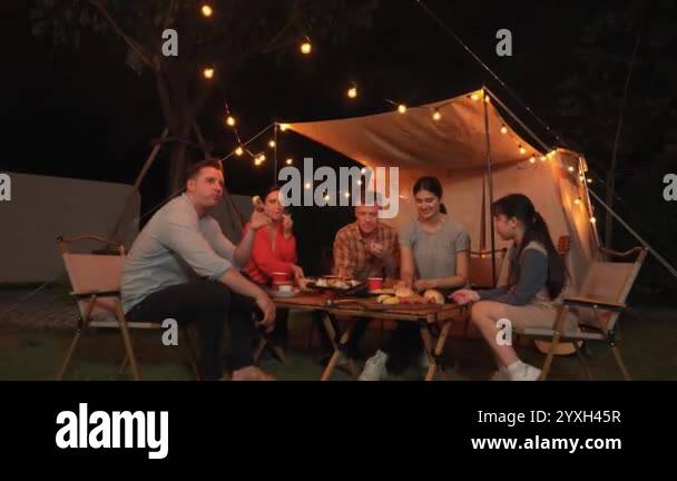 Family together celebrate holiday in garden. Family member gathering ...