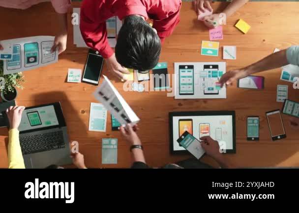 Top view of smart software developer planning software development. Skilled programmer team ...