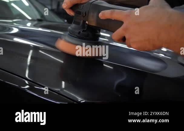 Car polishing and detailing 4k video. Hands with orbital polisher ...