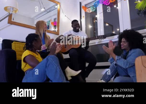 Multi ethnic friends are clapping their hands in slow motion as a ...