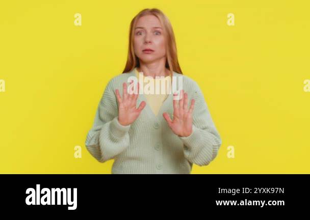 I am not guilty. Caucasian middle-aged woman pointing fingers herself ...