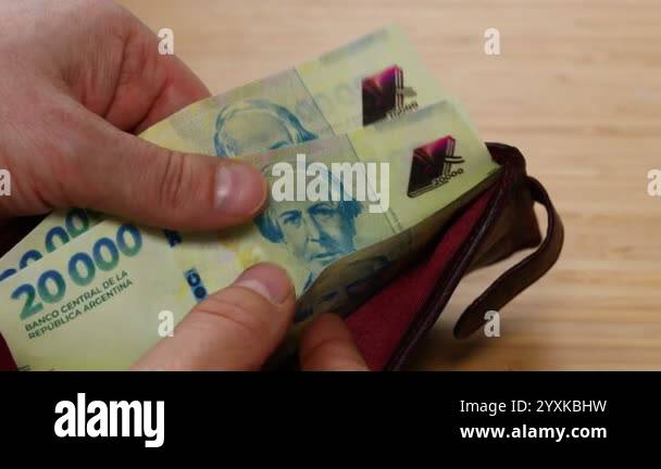 Argentina money. New banknotes of 20,000 Argentine pesos in wallet ...