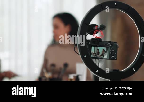 Rear view camera screen recording two women influencer shoot live ...