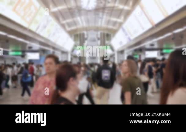 out of focus view on skytrain station platform with crowded of ...