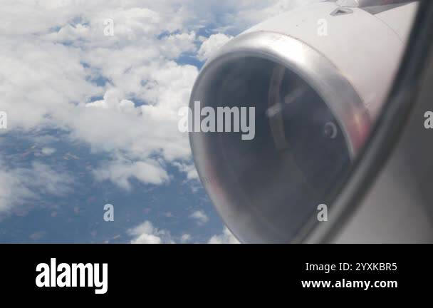 View from airplane aircraft window with airplane's engine while flying ...