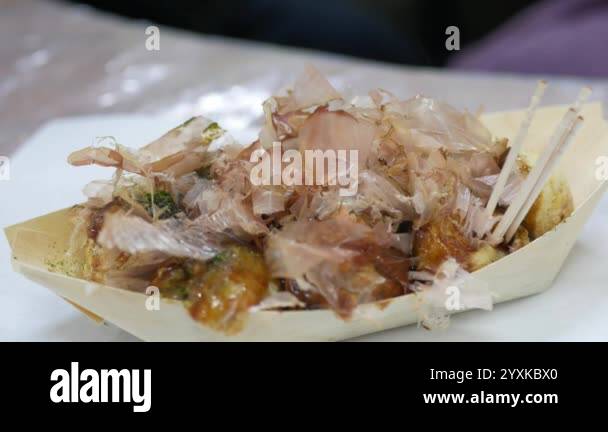 close up to Takoyaki japanese snack in osaka style fired ball with ...
