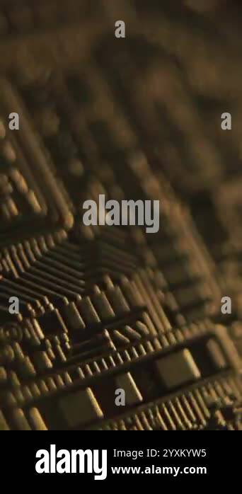 Vertical shot of golden bitcoin coin spinning on the red background ...