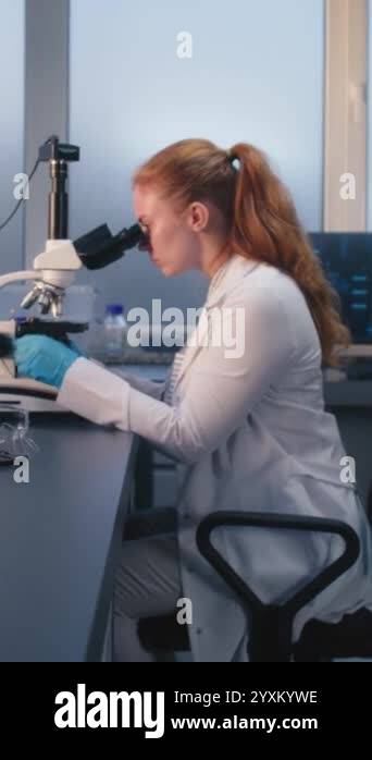 Medical science laboratory: Dolly shot of professional female ...