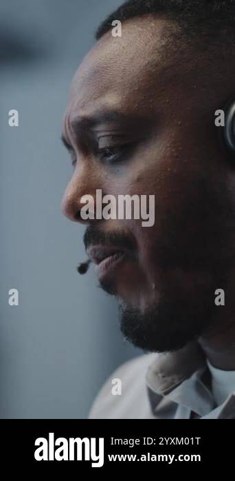 Call center office of mental health helpline: Vertical shot of upset ...