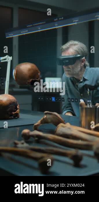 Vertical shot Archaeologist in VR headset examines ancient human ...