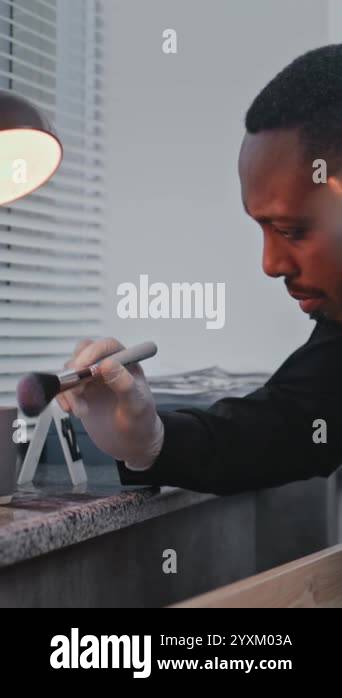 Murder or robbery case: African American policeman finds fingerprints ...