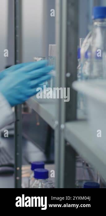 Medical science laboratory: Female chemist in white coat takes test ...