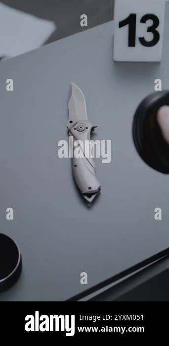 Robbery or murder case: Vertical shot of forensic scientist taking ...