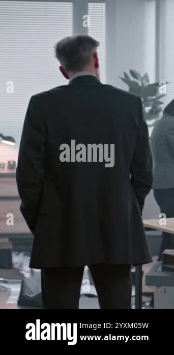 Office robbery case: Crime investigation team working. Back view of ...