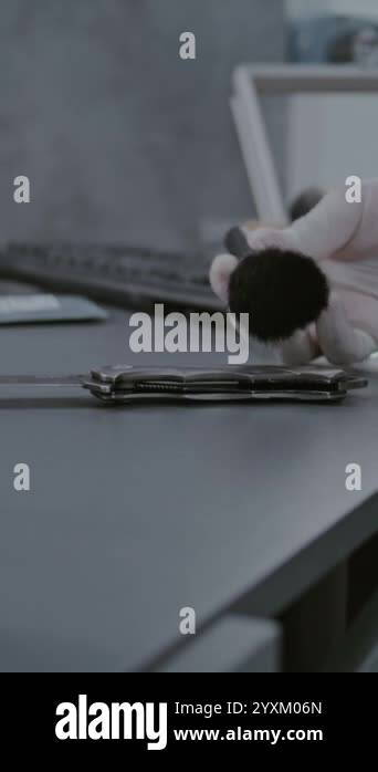 Murder or robbery case: Vertical shot of criminalist or forensic ...