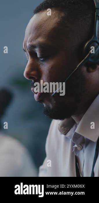 Call center office of emotional support line: Portrait of African ...