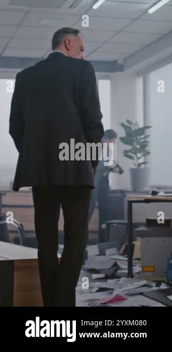 Vertical shot. Crime investigation team working. Male detective ...