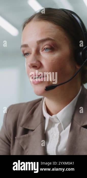 Female marketing manager or customer support specialist works in modern ...