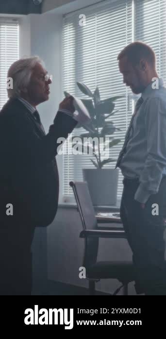 In modern office of bank: Irritated and angry boss having fight with ...