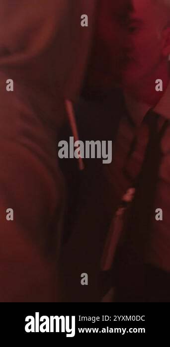 Vertical shot of diverse people in panic and fear running around ...