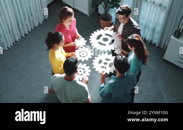 Top view of professional business team working together to gather cog ...