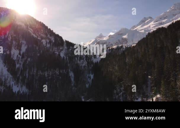 Alps. Mountains in Europe. Snow-covered mountains. A village in the ...