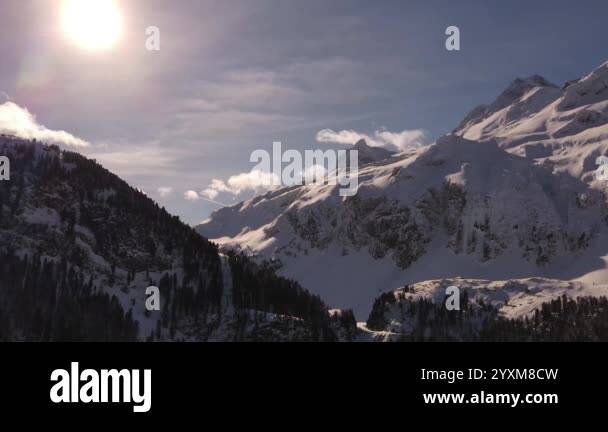 Alps. Mountains in Europe. Snow-covered mountains. A village in the ...