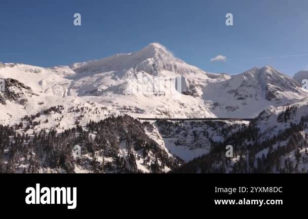 Alps. Mountains in Europe. Snow-covered mountains. A village in the ...
