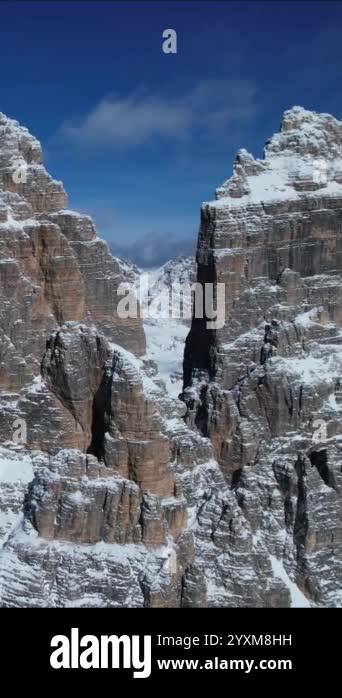 Explore breathtaking views of the snow-dusted Alps, showcasing towering ...