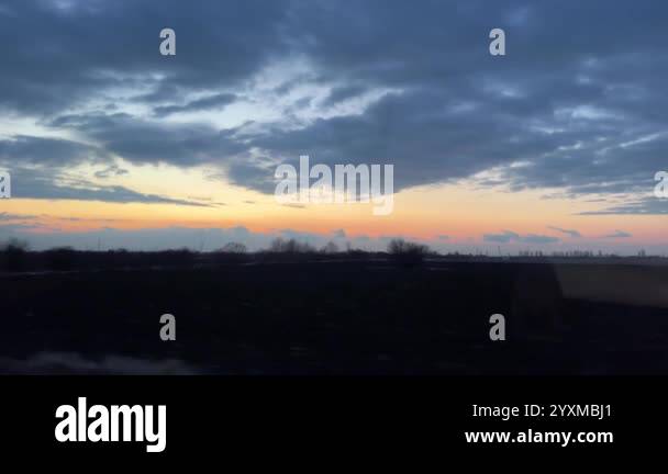 Beautiful sandy field with blue sky and fast moving clouds. Tropical ...