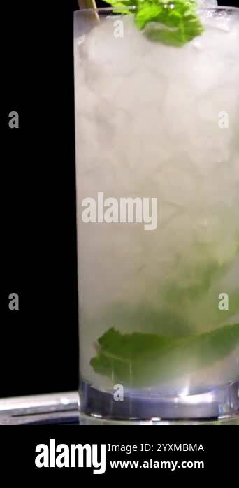 Super slow motion of making mojito cocktail. Filmed on high speed ...