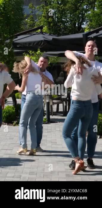 Vibrant Street Dance at Brazilian Carnival, Joyous Group Embracing ...