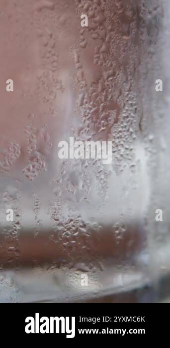 Throw ice cubes in empty glass. Ice Cubes falling down in empty ...