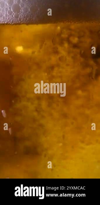 Super slow motion of pouring beer. Filmed on high speed cinema camera ...