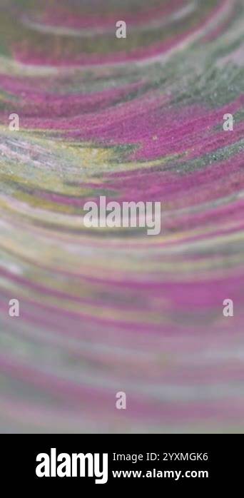 Vertical video. Paint drip. Sparkling fluid texture. Defocused pink ...