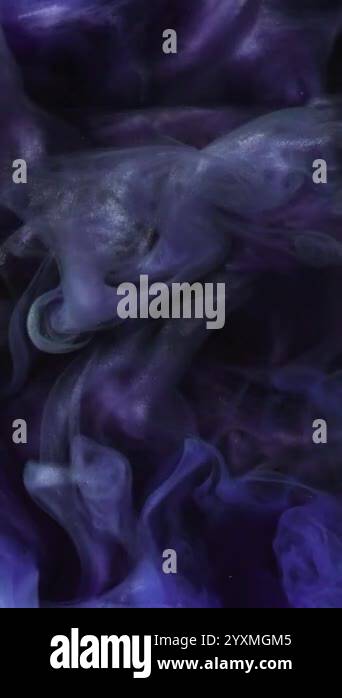 Vertical video. Glitter ink water. Night mist. Defocused blue purple ...
