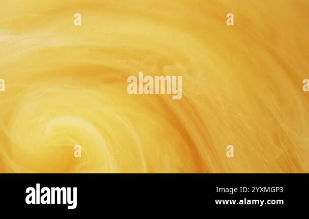 Paint swirl. Whirl rotation. Defocused bright yellow orange cloud ink ...