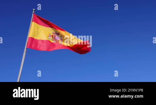 Slow motion footage of a beautiful Spanish flag, showing the flag from ...