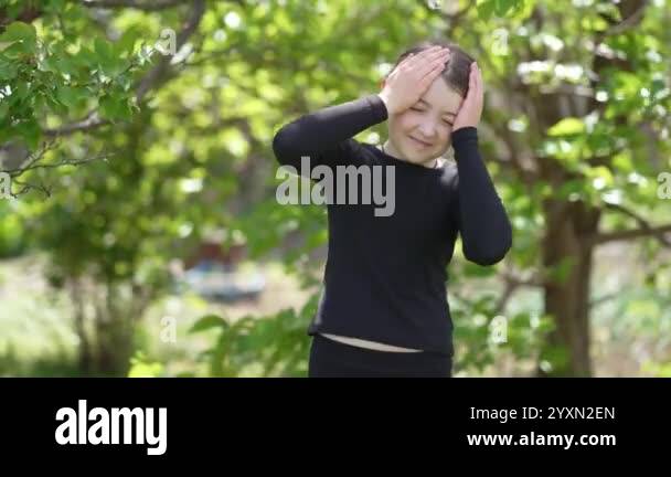 Child Expressing Regret and Confusion While Surrounded by Green Foliage ...