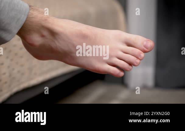 Close up teenager foot with toes and nails. Detailed shot adolescent ...