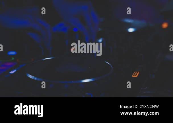 dj dj dj playing in modern club. party and dj 's dj with various dj ...