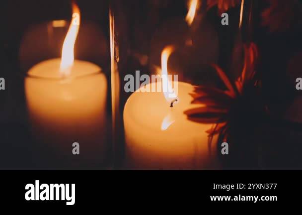 burning wax candle with blurred background Stock Video Footage - Alamy
