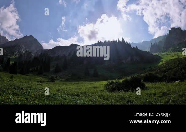Breathtaking tian shan mountain view that highlights vibrant green ...