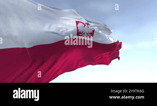 Close-up of Poland national flag waving in the wind on a clear day. Two ...