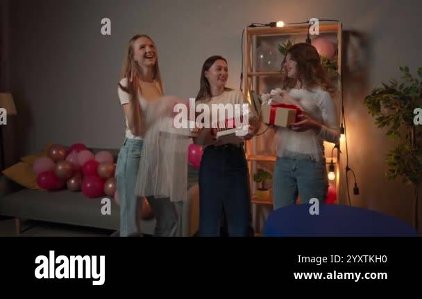 Pre-wedding girlfriends party. Group of young women friends celebrating ...