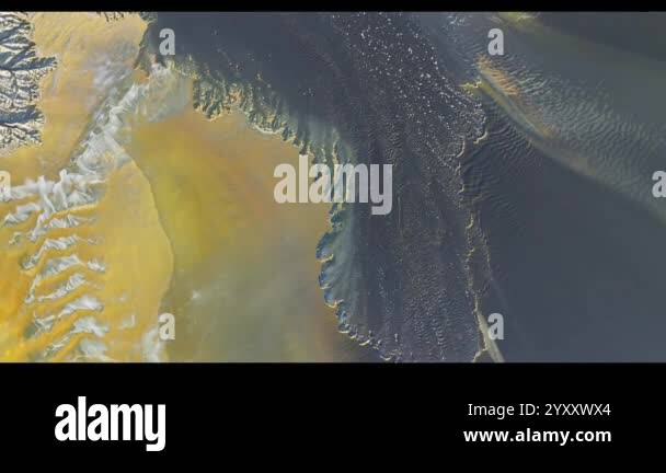 An aerial view of abstract textures in a muddy landscape resembling ...